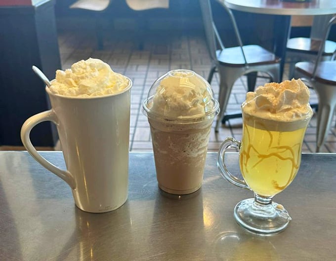 The holy trinity of diner beverages: a towering whipped cream-topped hot chocolate, a frappe, and something caramel-drizzled that's calling your name.