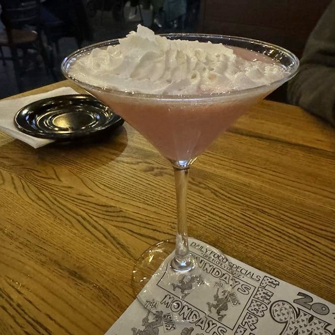 Even the cocktails at Whitey's are Instagram-worthy—this frothy pink martini proves they take the "Booze" part of their name as seriously as the "Burgers."