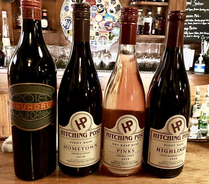 The Hitching Post doesn't just serve wine; they make their own. These bottles aren't just accompaniments to your meal—they're part of the story.