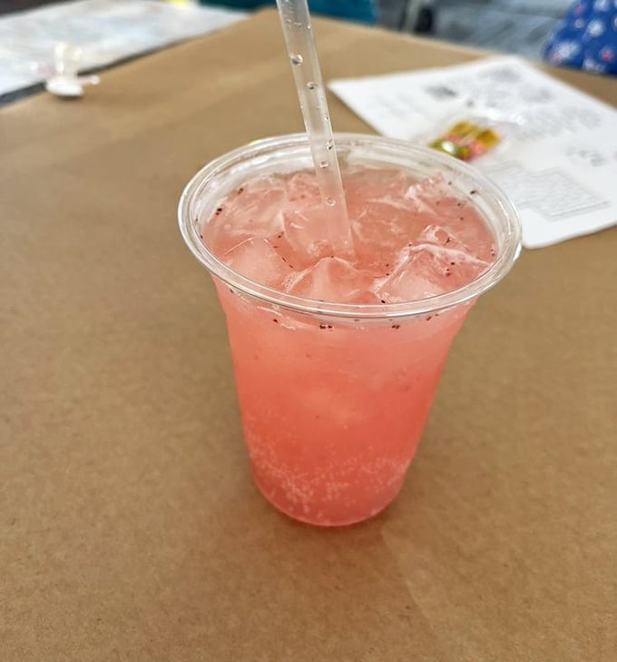 This isn't just a pink drink—it's summer in a cup, designed to wash away worries and complement crab-cracking marathons.