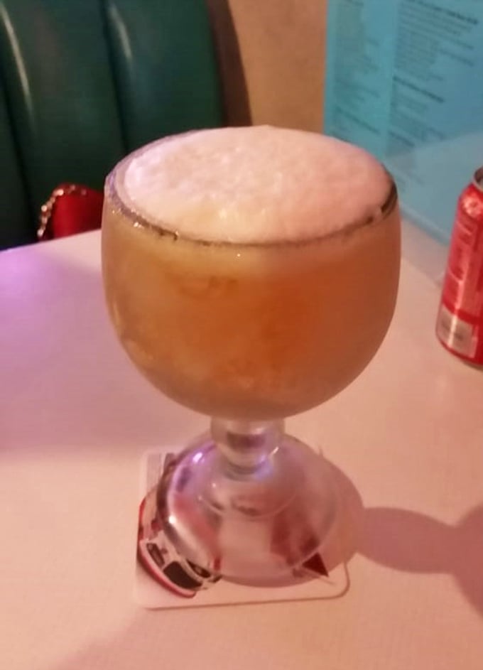 This frosty goblet isn't just a drink, it's a vacation in glassware form – the perfect companion to tame the Cajun spice parade.