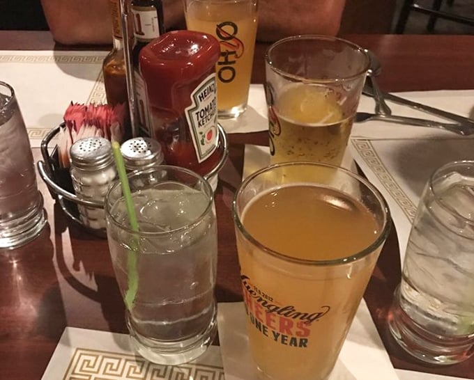 The beverage situation at Hickory Bar-B-Q—where a cold beer and classic condiment caddy remind you that some dining traditions are timeless for good reason.