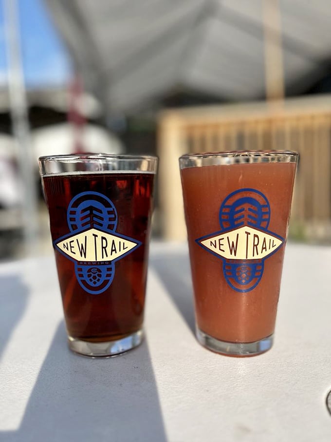 Local brews in branded glasses—because what pairs better with smoke than something crafted just down the road?