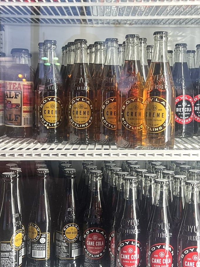 Old-fashioned sodas in glass bottles – because proper barbecue deserves a proper beverage companion. That satisfying "pop" when you open one is practically musical.