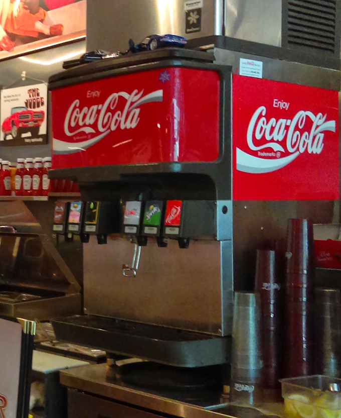 The soda fountain – dispensing liquid happiness since before TikTok was a thing. That familiar hiss of carbonation is music to nostalgic ears.