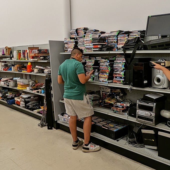 The DVD section—a physical Netflix where $2 buys you a movie night without subscription fees or internet requirements.