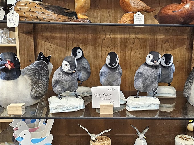 These penguin figurines aren't just decorative—they're judging your home decor choices with their permanently surprised expressions.
