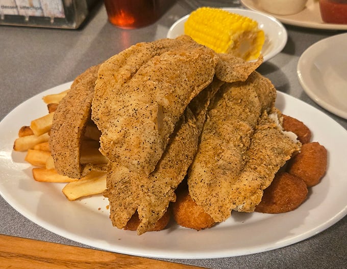 Cornmeal-crusted fish fillets that could make a pescatarian weep with joy. The kind of comfort food that feels like a warm hug from a salty sea captain.