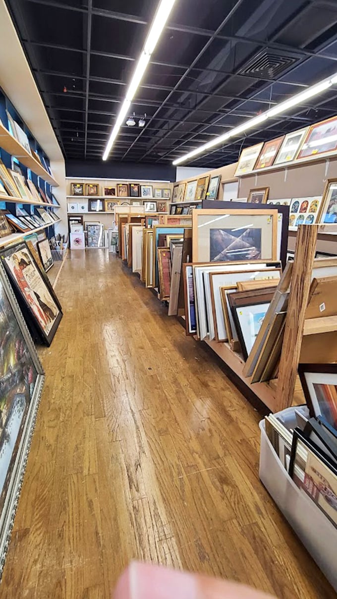 The art gallery section—where forgotten masterpieces and quirky prints lean against each other, waiting for the right wall to call home.