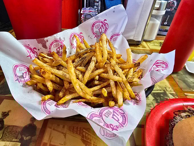 These hand-cut fries aren't just a side dish—they're golden, crispy supporting actors that sometimes steal the show from the burger headliner.