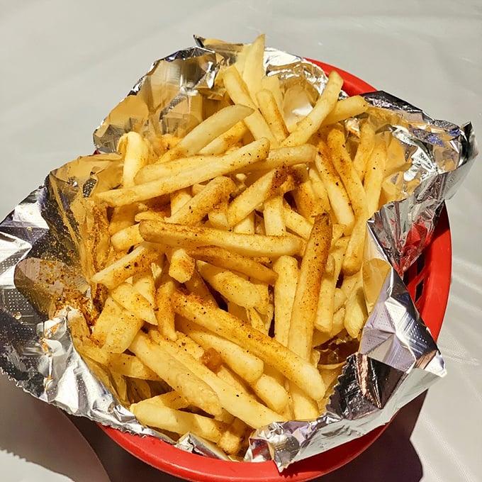 Even the humble french fry gets the Cajun treatment, dusted with spices that transform the ordinary into something worth fighting over.
