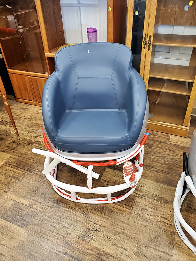 Not just a chair, but a conversation piece—this football helmet seat screams "man cave masterpiece" or "the divorce is now final."