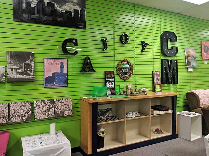 A boutique's bright green accent wall showcases local flair—proof that not everything in outlet malls is mass-produced corporate sameness.