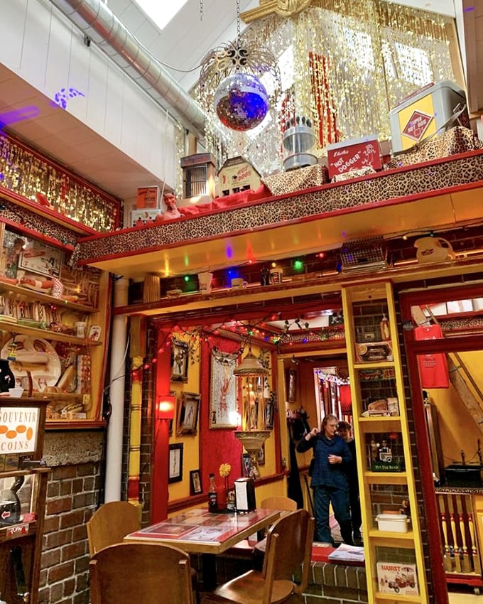 Disco balls and gold trim transform this tiny eatery into a hot dog palace—proving that sometimes the most magical dining experiences come in the smallest packages.