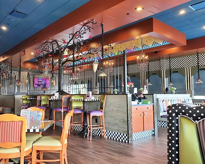 The dining area feels like the set designer from Wes Anderson's latest film decided to open a diner—colorful, quirky, and impossible not to smile at.