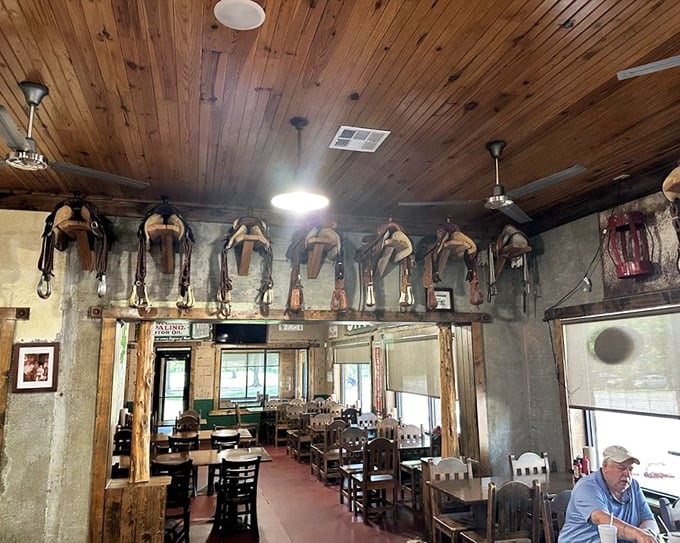 Where western heritage meets meat mastery – those saddles on the wall have witnessed countless "first bite" faces that words simply cannot describe.