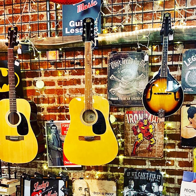 Six-string dreams hanging on brick walls. These guitars have stories to tell—some might have played "Free Bird" at a backyard wedding, others just waited patiently for their big break.