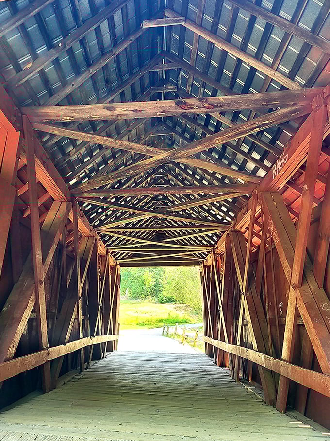 Looking up inside the bridge reveals an intricate wooden skeleton – a testament to early 20th-century engineering that continues to stand strong.