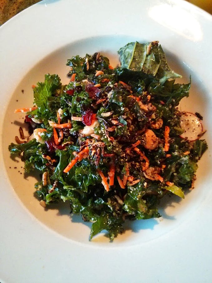 A kale salad that could convert even the most dedicated carnivore. Those vibrant colors aren't just Instagram-worthy – they're nutrient-packed deliciousness.