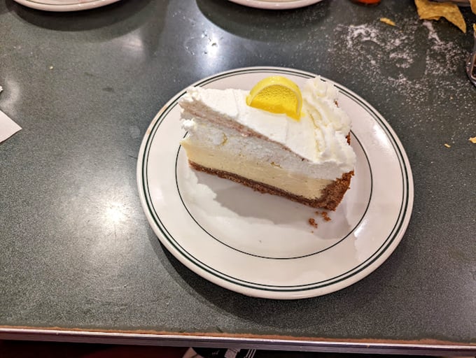 Key lime pie with attitude—tangy, sweet, and topped with a dollop of whipped cream that says, "Yes, you deserve this."