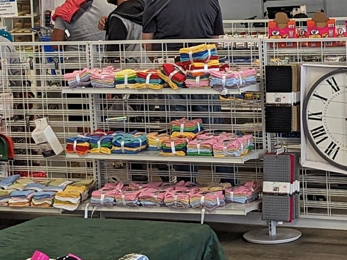 Kitchen towels in every color of the rainbow, neatly bundled like contestants in a beauty pageant of practical household items.