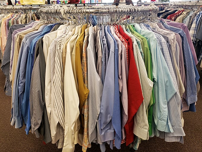 Men's shirts lined up like soldiers awaiting inspection. Each one has a story and possibly a mysterious stain or two.