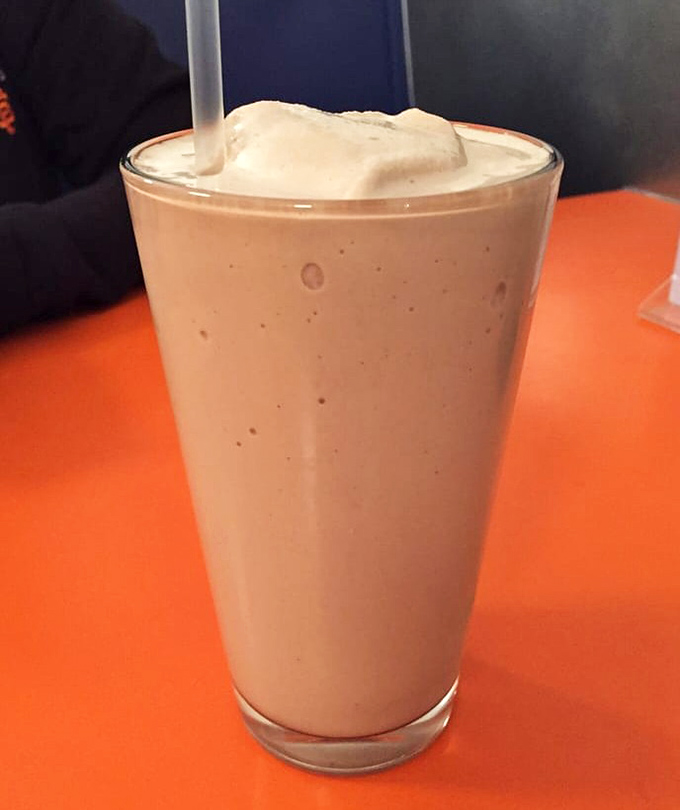 A milkshake thick enough to require serious straw commitment. This isn't a beverage—it's dessert with ambition.