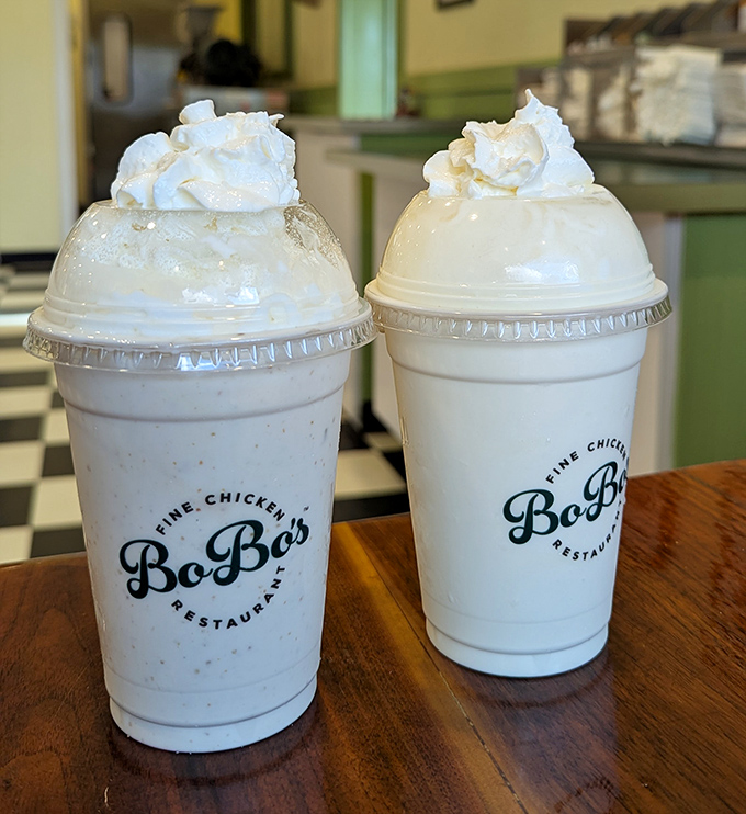 Milkshakes topped with clouds of whipped cream—the perfect cool companion to hot chicken. These aren't just drinks, they're desserts with straws.