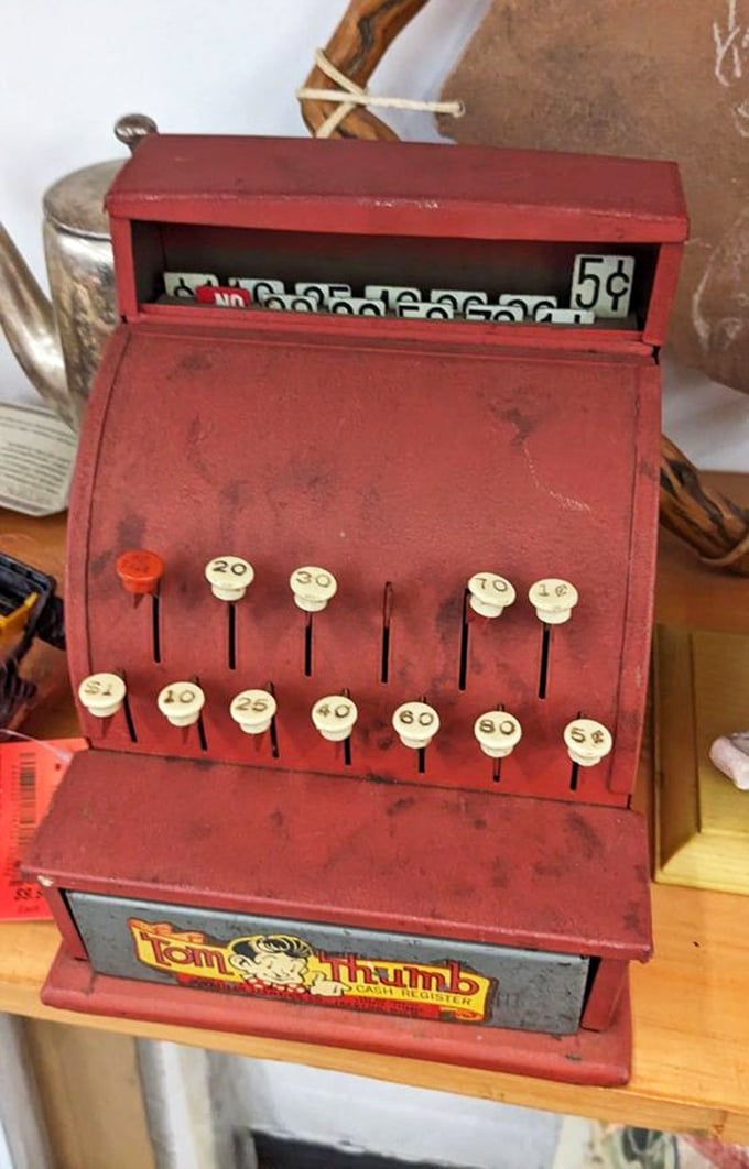 This vintage Tom Thumb cash register probably rang up five-cent candies in its heyday—now it's waiting to become someone's conversation-starting bookend.