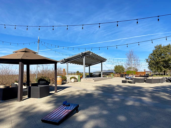 String lights hover above this outdoor gathering space—ready to illuminate evening revelry under Temecula's star-studded sky.