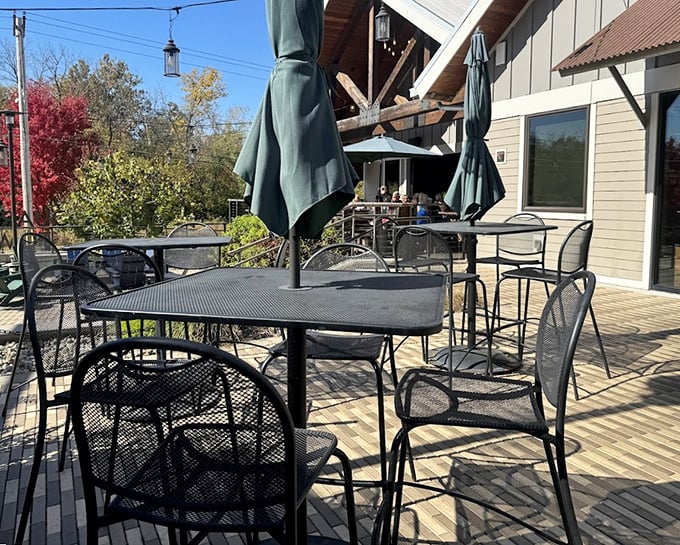 The patio at The Rock isn't just outdoor seating—it's an invitation to dine under Missouri skies with the perfect balance of sun and shade.