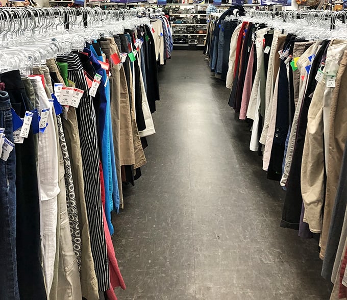 The pants corridor—a denim democracy where designer labels and everyday brands share the same rack space and price point.