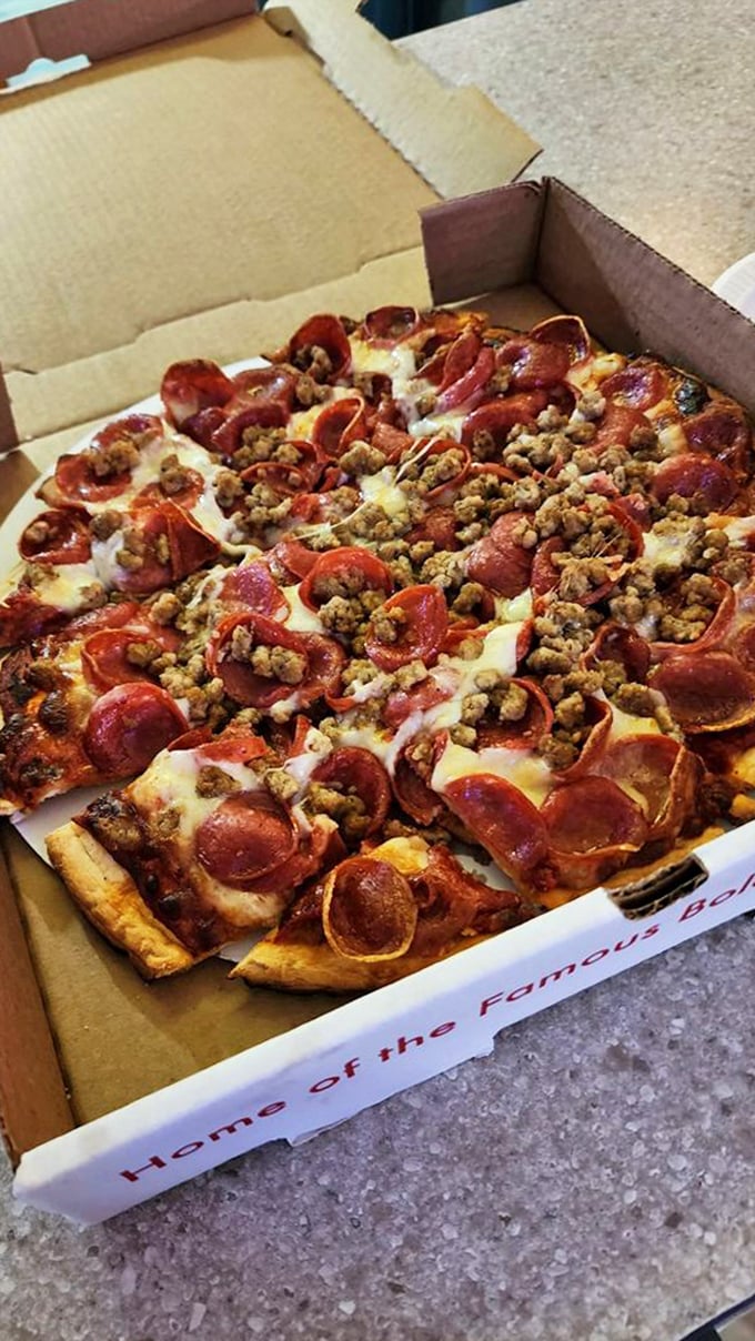 Pizza perfection in a box – pepperoni curled into flavor cups, seasoned ground beef, and cheese melted to that ideal sweet spot of gooeyness.
