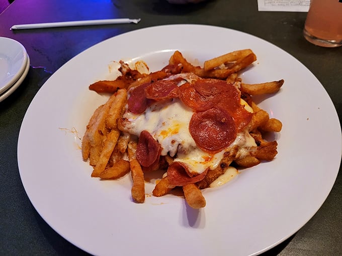 Pizza fries: the dish you didn't know you needed until this very moment. Melted cheese, pepperoni, and fries in perfect harmony – diet starts tomorrow!