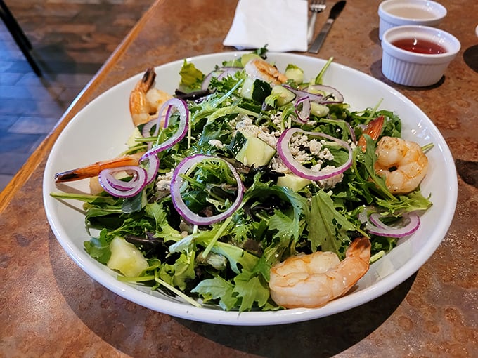 Even the salad gets the star treatment. Those plump shrimp and fresh greens prove Dee Jay's doesn't just excel at meat—it respects the entire food pyramid.