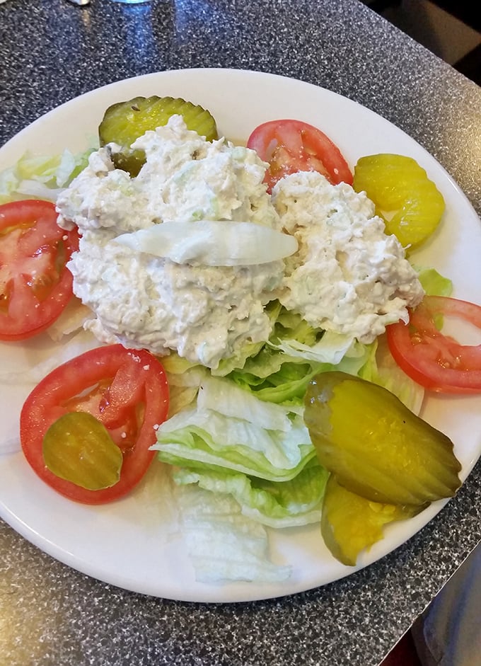 Even the salad at Kuppy's comes with personality—a generous scoop of chicken salad surrounded by fresh veggies that somehow makes eating healthy feel indulgent.