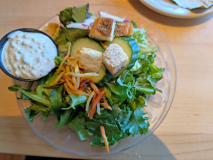 Fresh salad topped with house-made croutons starts your meal right, though let's be honest – you're saving room for beef.