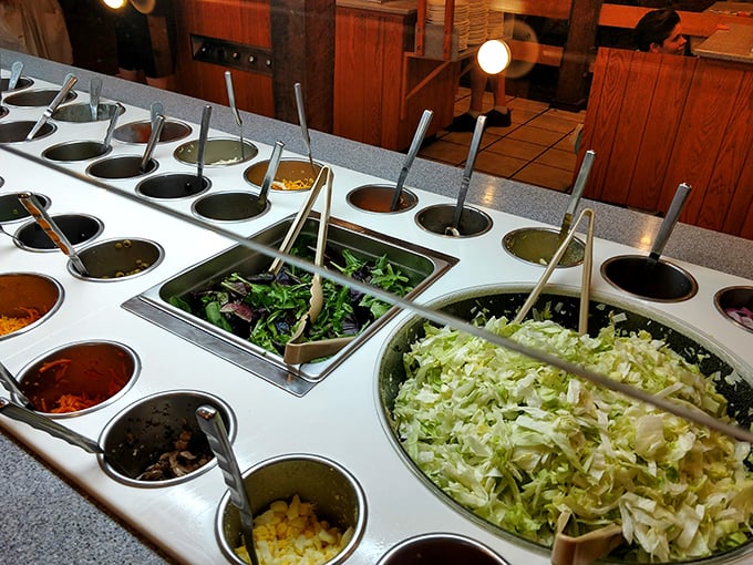 The salad bar – where good intentions meet temptation, and "just a little bit of everything" becomes a structural engineering challenge.