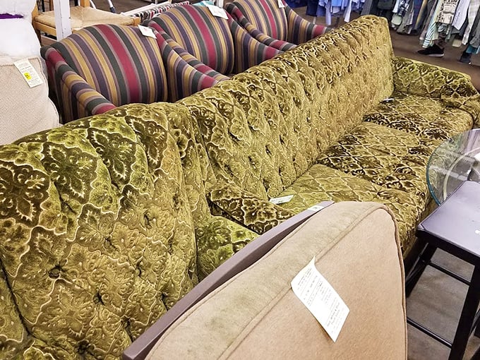 That avocado-green velvet sofa isn't just furniture—it's a conversation piece waiting to happen. "Yes, it's vintage" sounds better than "Yes, it's used."