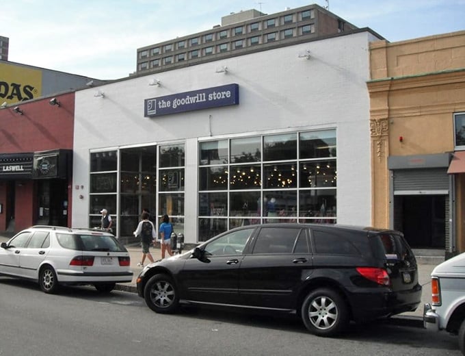 Urban thrifting at its finest—nestled between neighborhood shops where savvy Bostonians park for quick treasure-hunting missions.