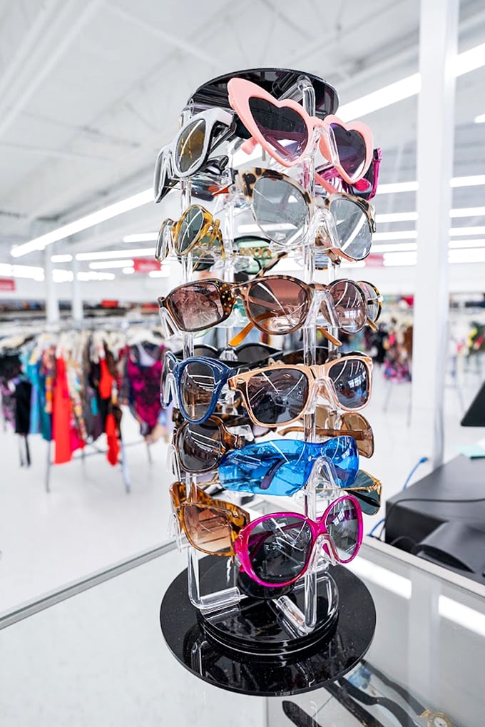 The sunglasses carousel – a spinning tower of personality where you can try on new identities for less than lunch.
