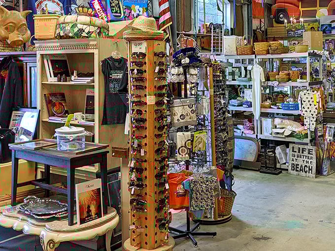 A rotating display of sunglasses stands sentinel among beach-themed merchandise—because even your vacation style deserves a vintage twist.