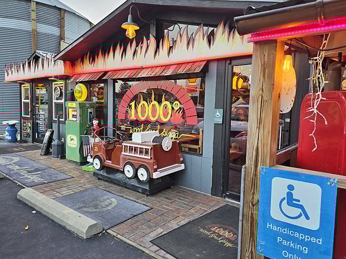 Flames painted along the roofline aren't just decoration – they're a preview of the wood-fired magic happening inside 1000° Pizza.