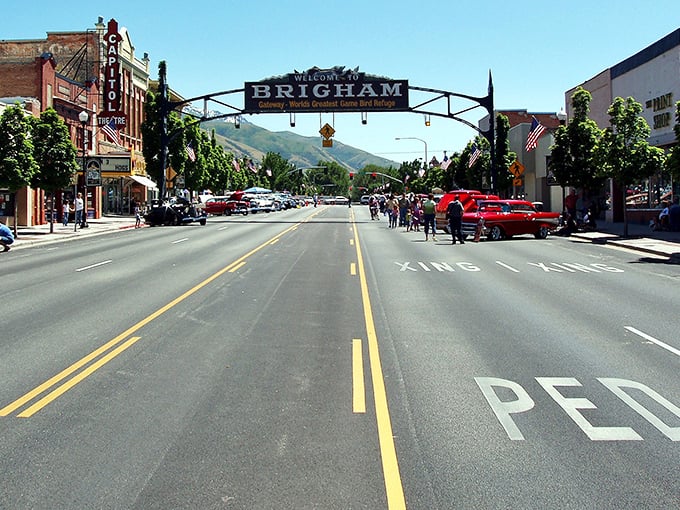 Brigham City's welcome arch promises more than just entry—it's a gateway to a world where your dollar stretches further.