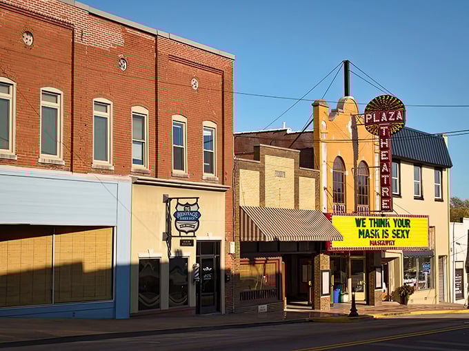 Vintage storefronts and faded advertisements tell stories of a town where history costs less than headlines.