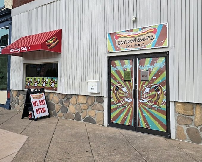 Hot Dog Eddy's psychedelic doors promise a flavor trip that's worth every colorful bite.
