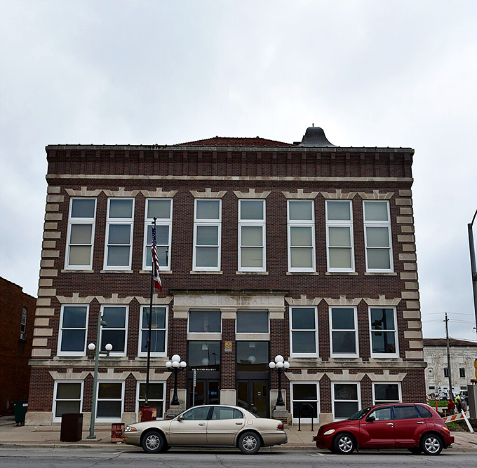 Oskaloosa's historic downtown buildings maintain their dignified presence, housing modern businesses behind classic facades.
