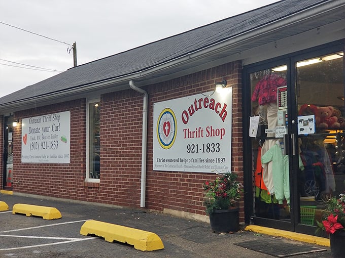 Outreach Thrift's brick facade and cheerful flowers welcome bargain hunters like old friends. Community spirit in every corner!