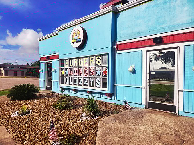 Papa Dogz's cartoon chef mascot promises playful flavors that live up to the vibrant building they're served in.