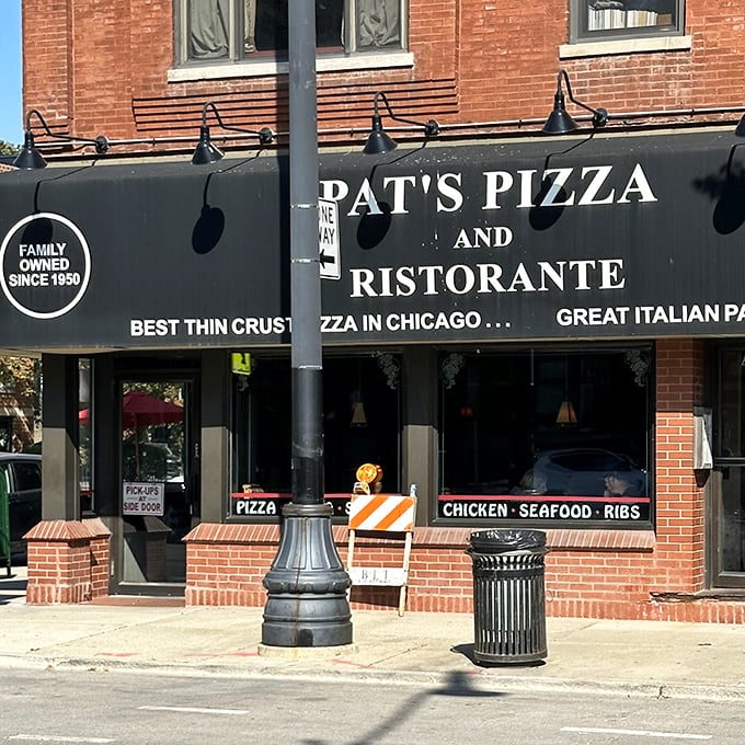 Pat's classic storefront proudly announces its family heritage – the pizza equivalent of a birth certificate.